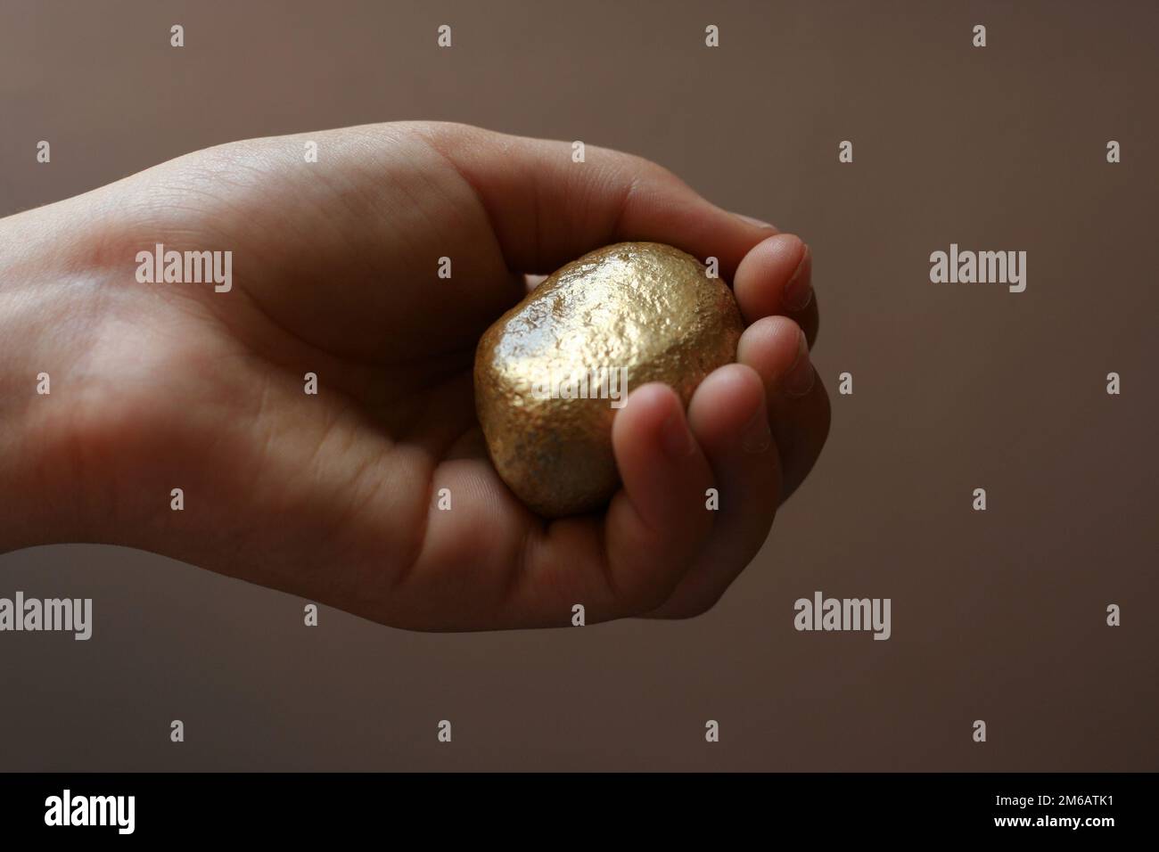Lump of gold Stock Photo - Alamy