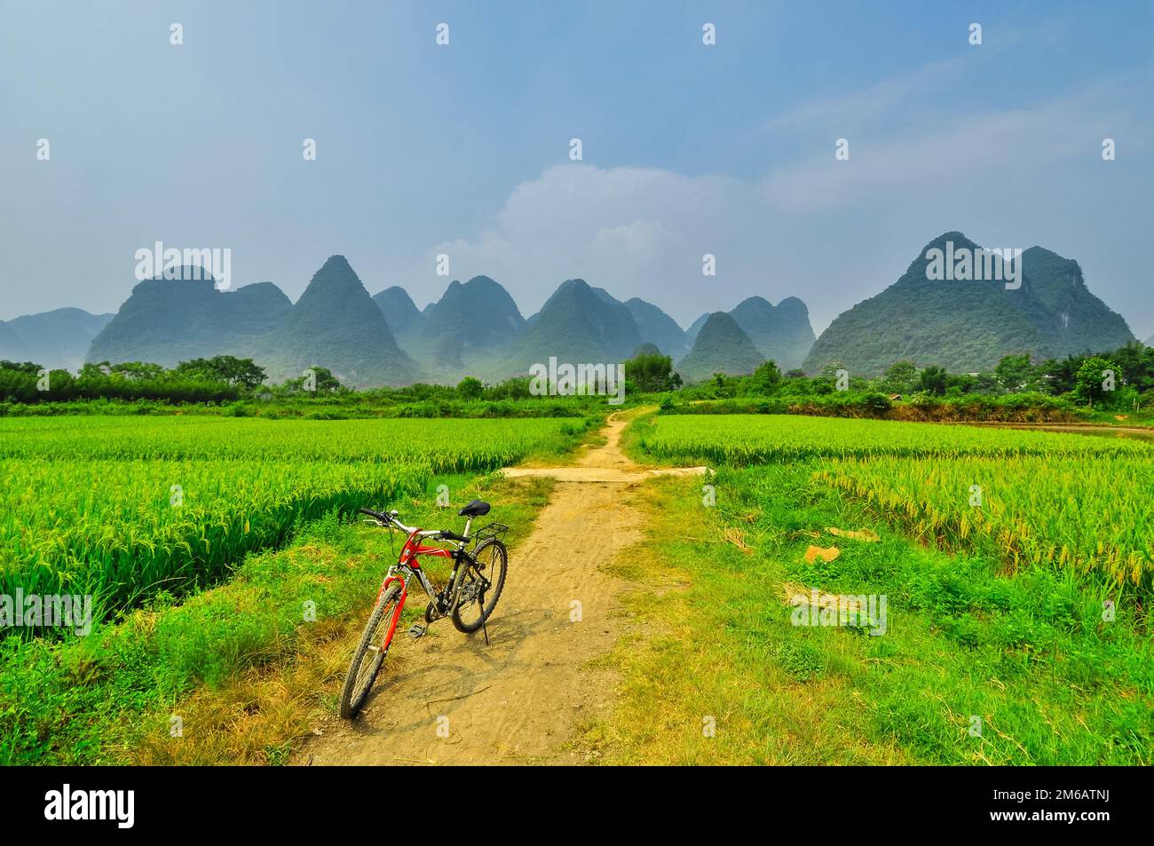 Biking on Li river mountain landscape in Yangshuo Guilin Stock Photo ...