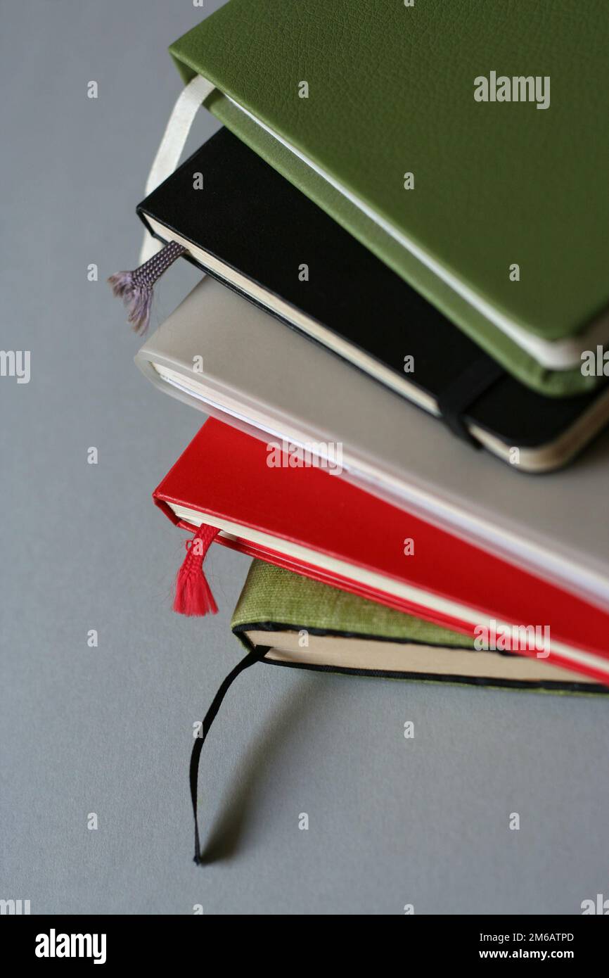Pile of notebooks Stock Photo - Alamy