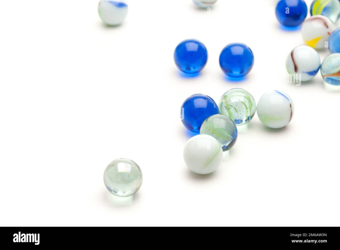 Blue transparent glass marbles hi-res stock photography and images - Alamy