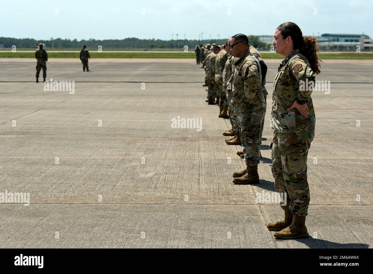 U.S. Airmen with the 156th Contingency Response Group, conduct a ...
