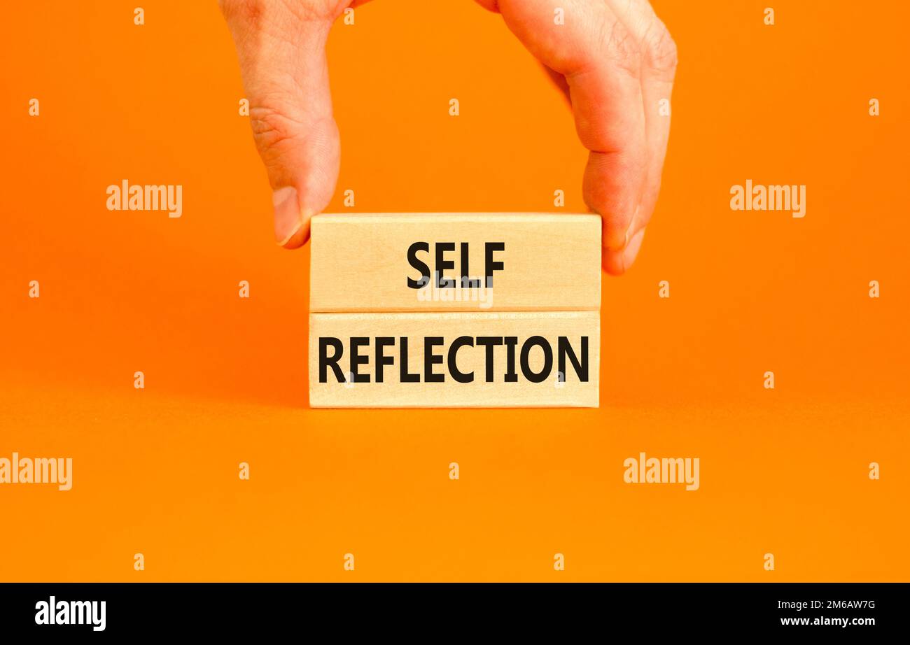 Self reflection symbol. Concept word Self reflection typed on wooden ...