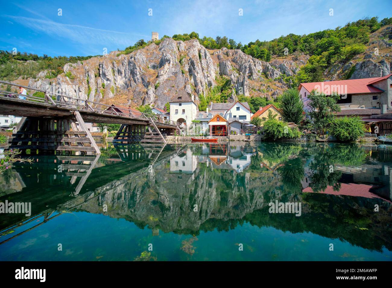 Old wooden bridge over the branch of the Altmuehl and Randeck Castle ...