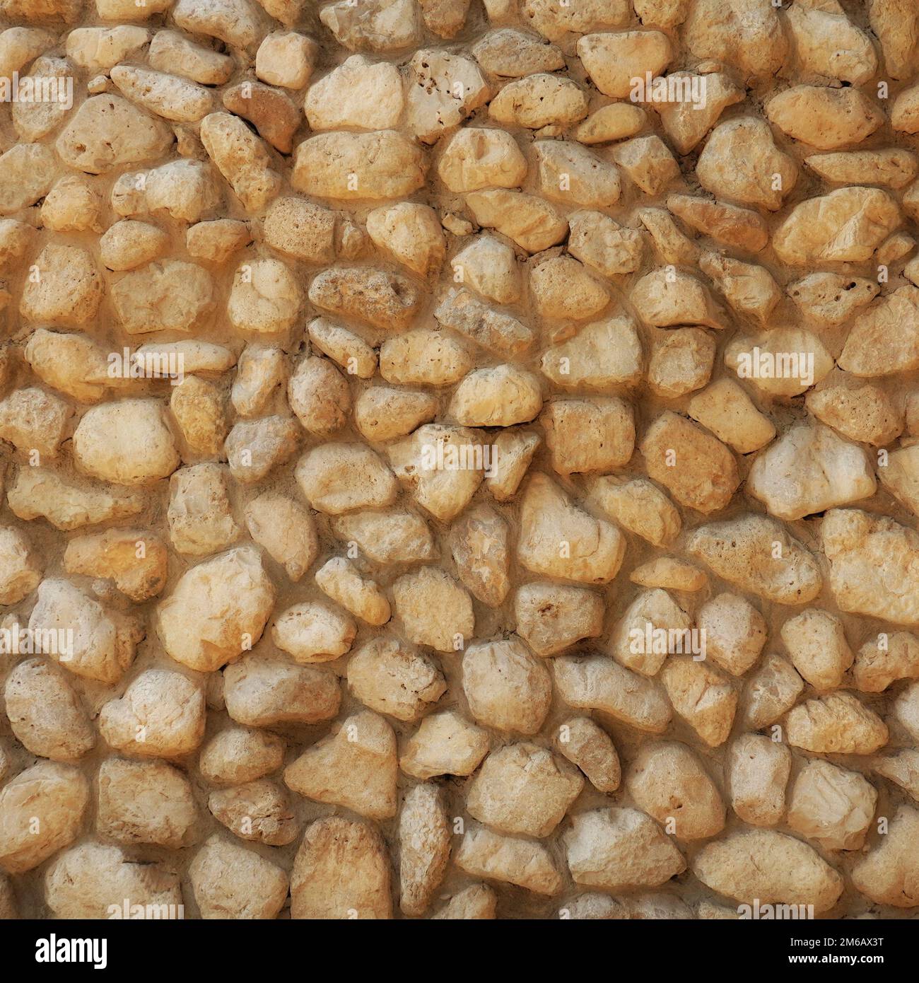 Stone wall rounded stones hi-res stock photography and images - Alamy