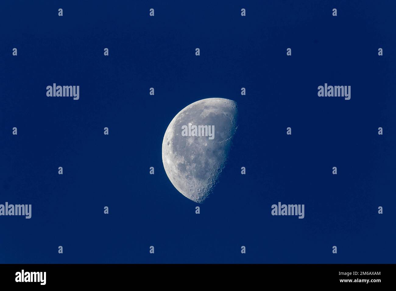 The half moon and blue sky Stock Photo - Alamy