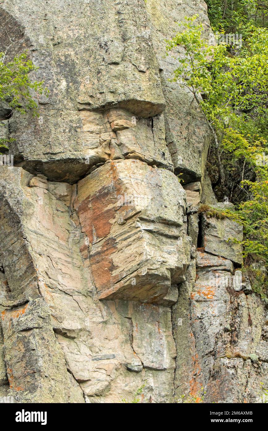 Rock that looks like a human face Stock Photo - Alamy