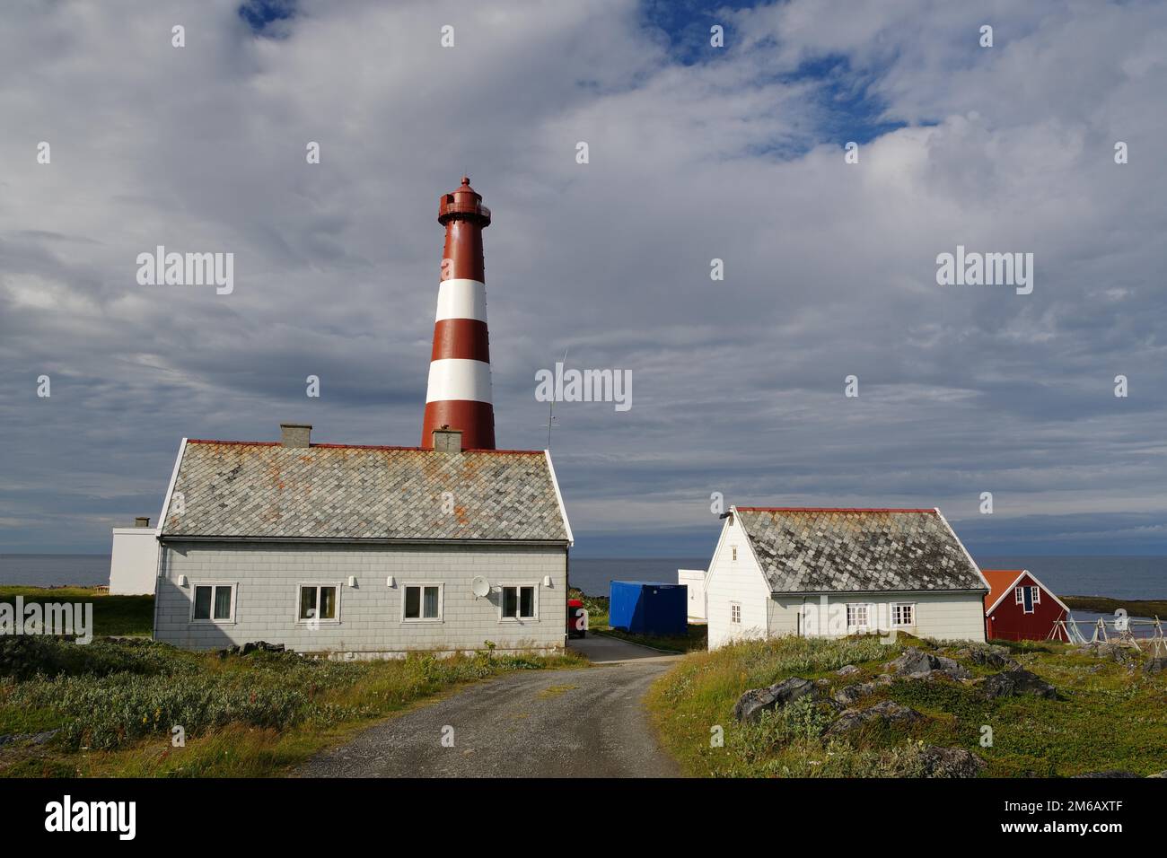 The world's northernmost lighthouse and a gravel road, barren landscape ...