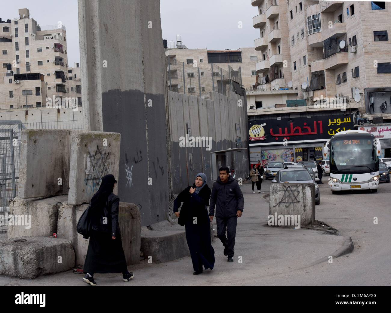 Shuafat Refugee Camp, Israel. 08th June, 2014. Palestinians walk near ...