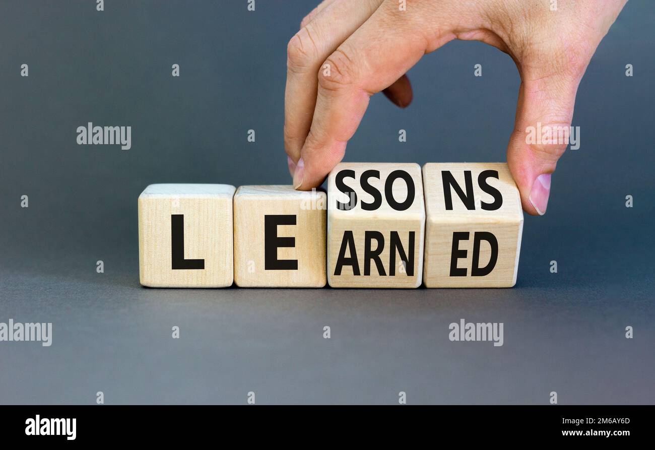 Lessons to learn symbol. Concept word Lessons learn on wooden cubes ...