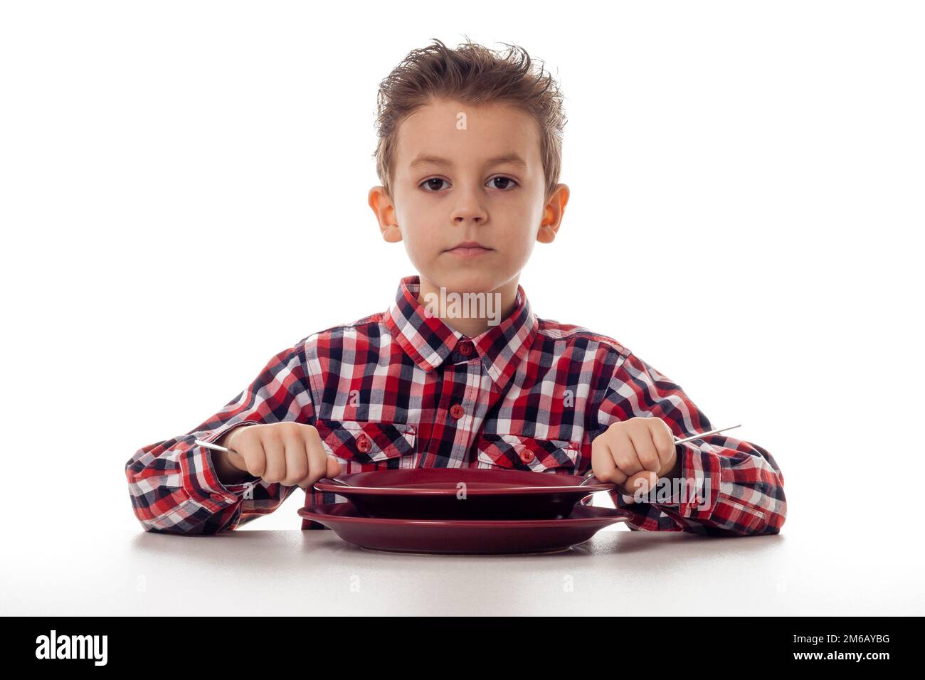 Happy boy waiting for food Stock Photo - Alamy