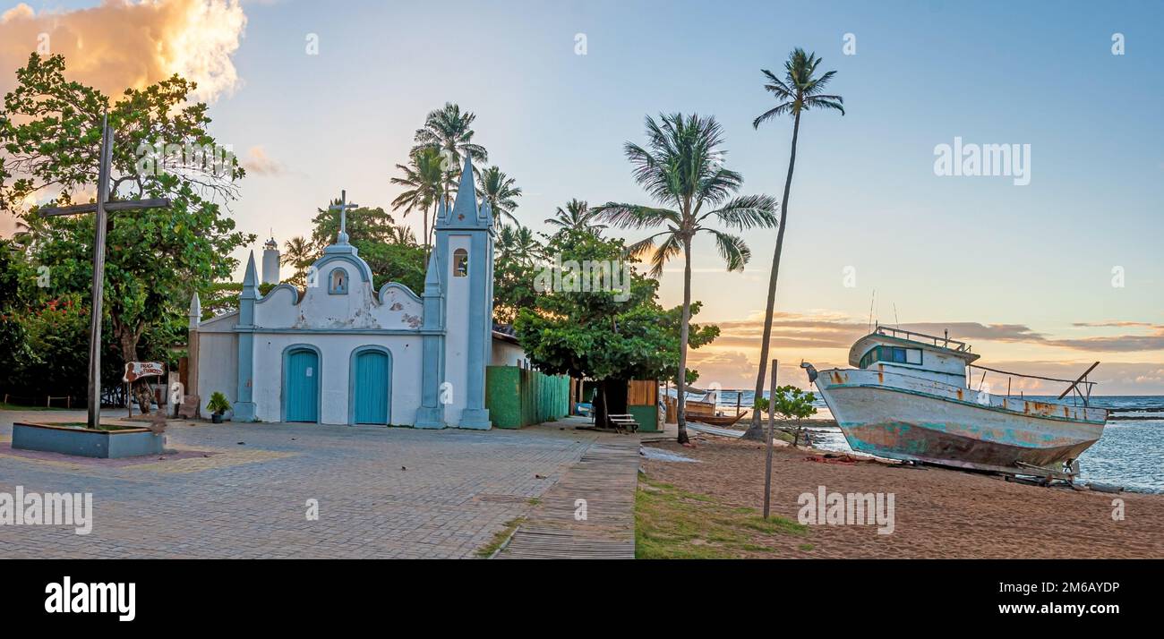 View of the historic church of Praia do Forte in Brazil at dusk with ...
