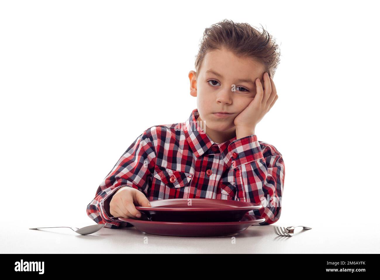 Child bored food plate hi-res stock photography and images - Alamy