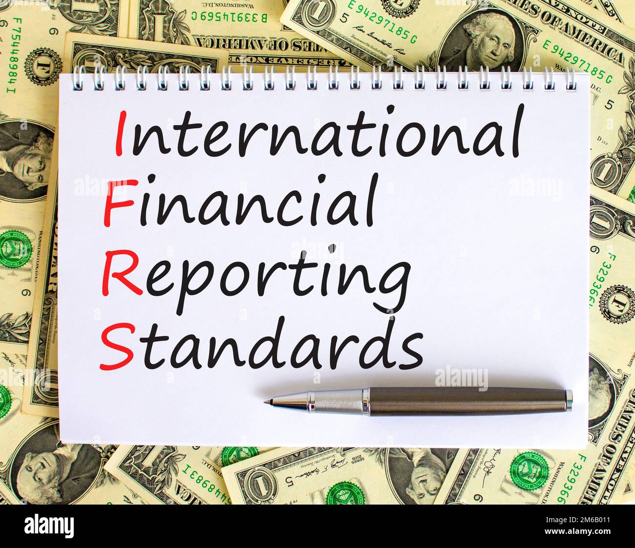 IFRS symbol. Concept words IFRS international financial reporting standards on white note on ...