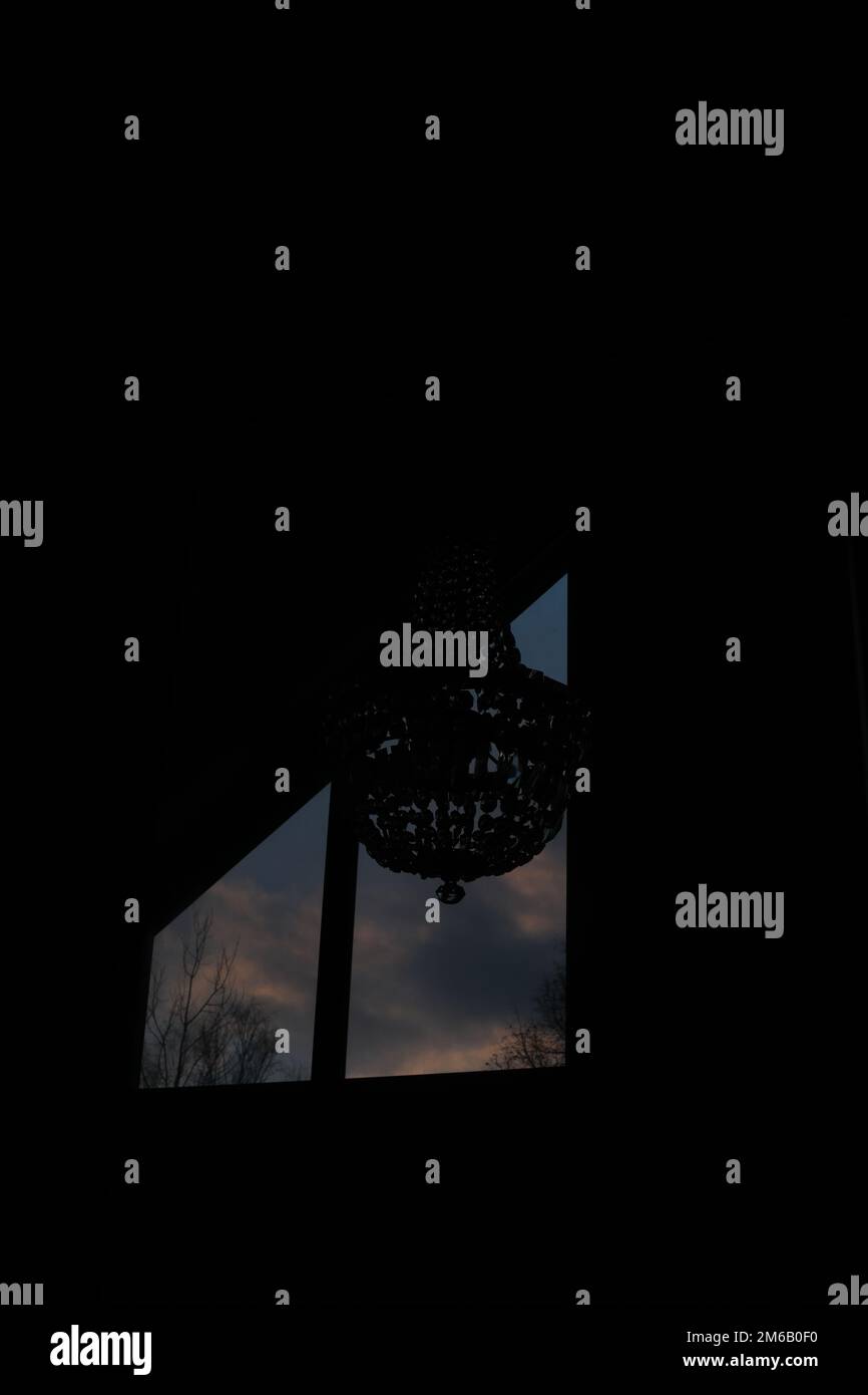 The view from the window of the dramatic sunset sky with clouds Stock ...