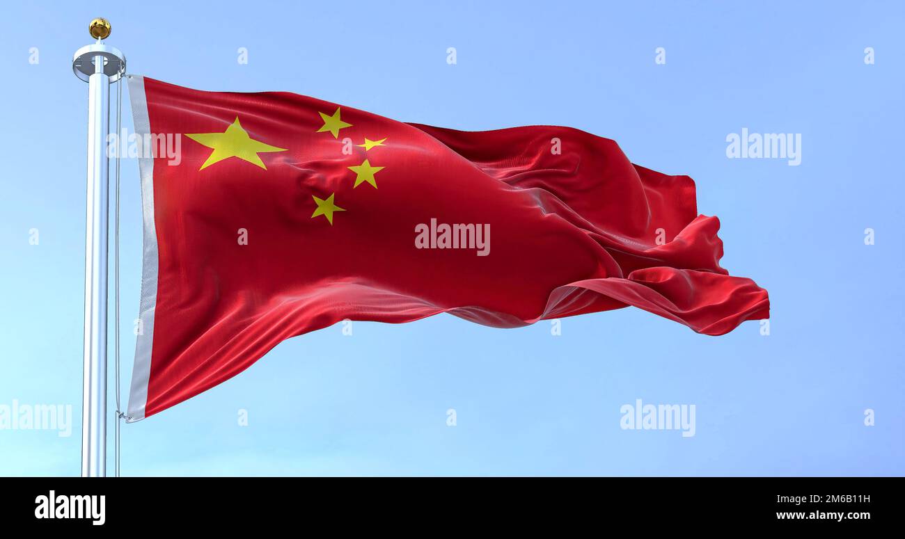 Close-up view of the China national flag waving on a clear day. People ...