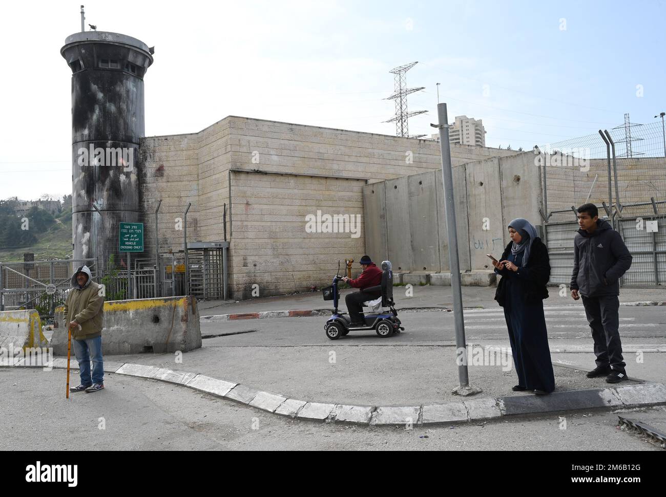Shuafat Refugee Camp, Israel. 03rd Jan, 2023. Palestinians stand near ...