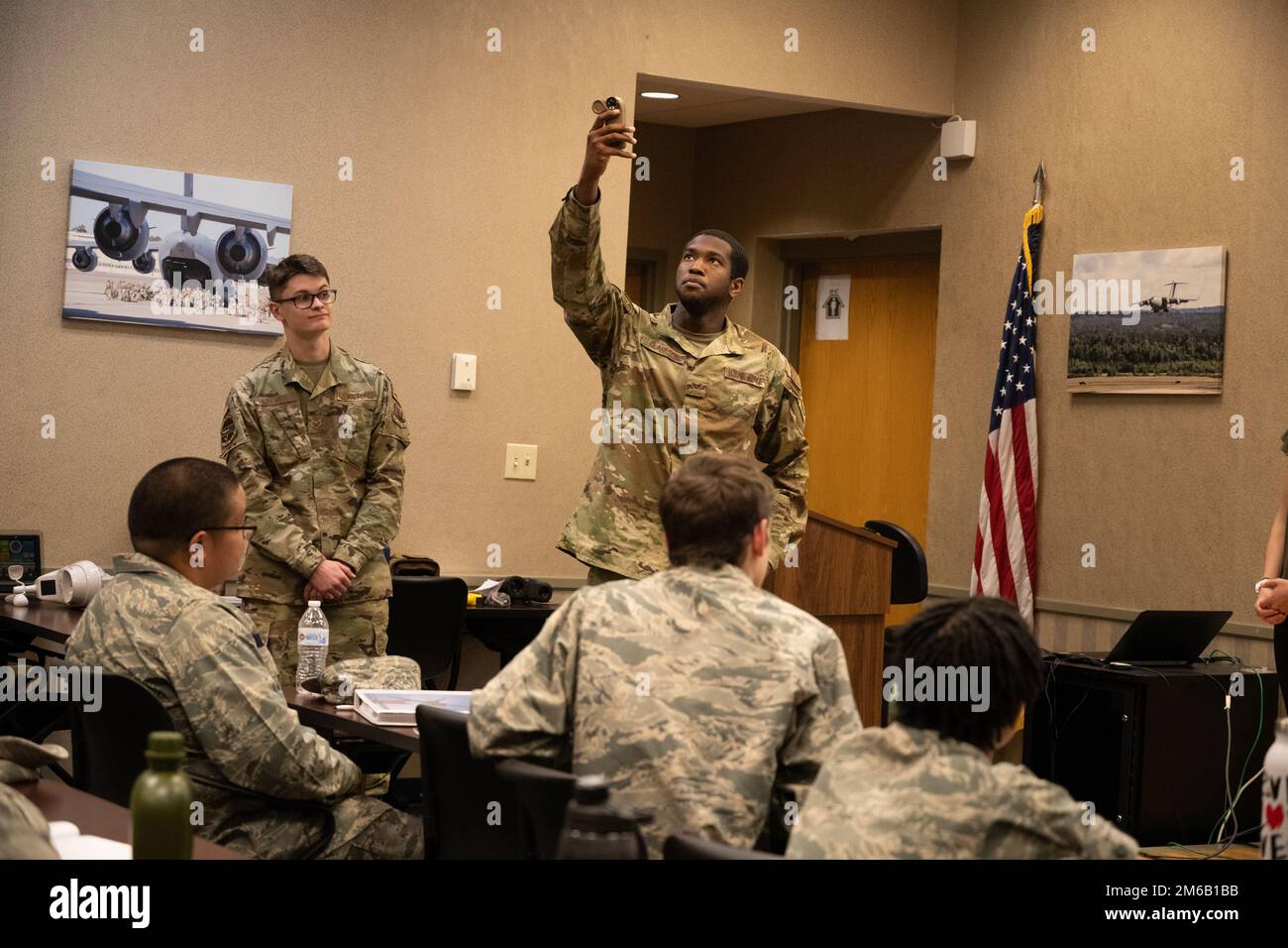 U.S. Air Force 18th Combat Weather Squadron Airmen discuss meterology ...