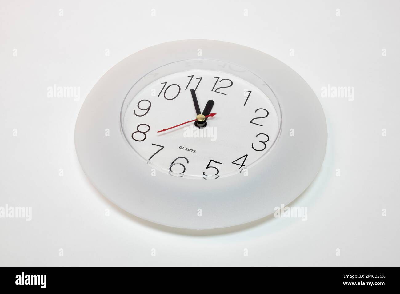 Wall clock shows 5 to 12, symbol image Stock Photo - Alamy