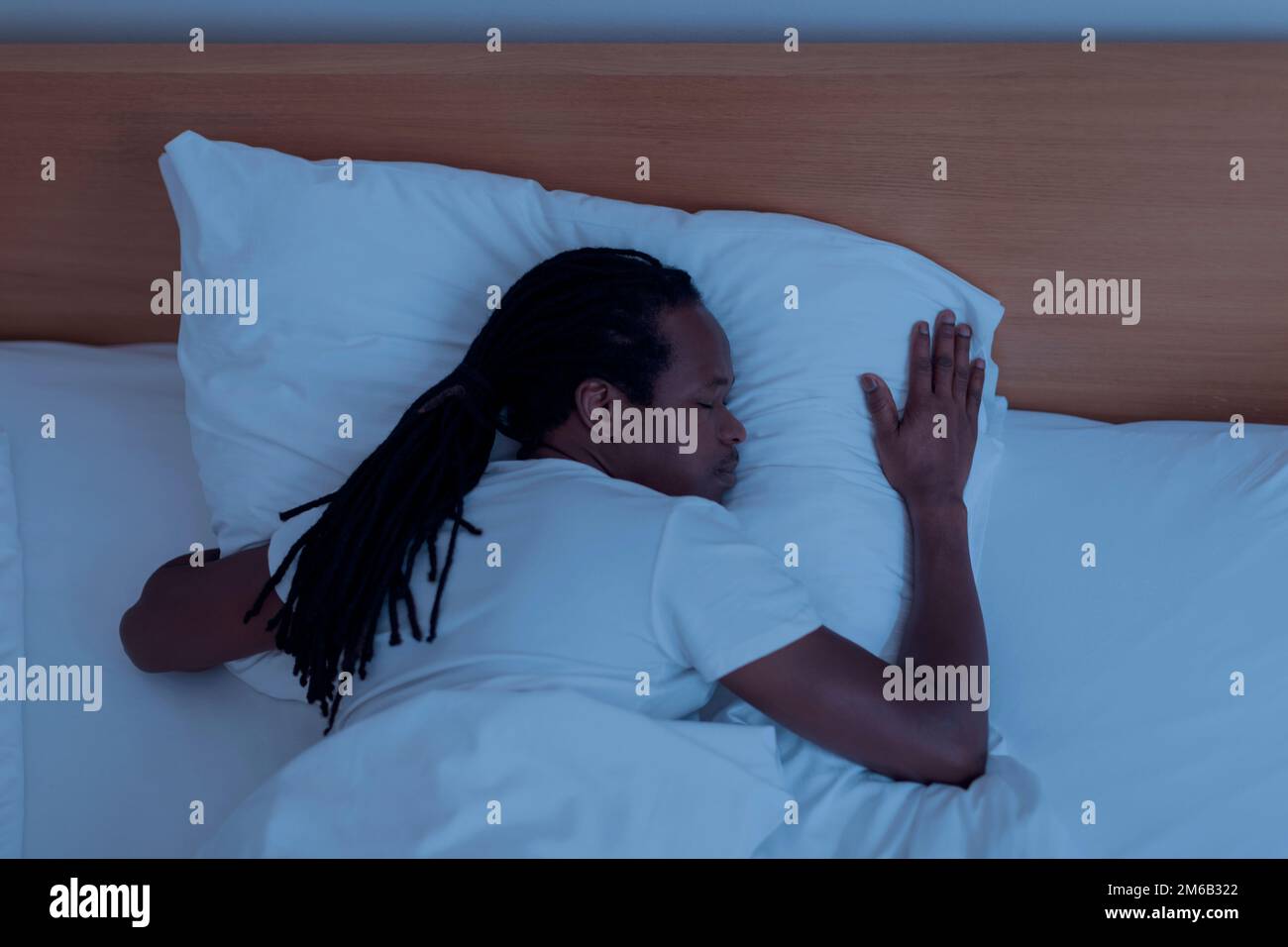 Man deep sleep bed hi-res stock photography and images - Alamy
