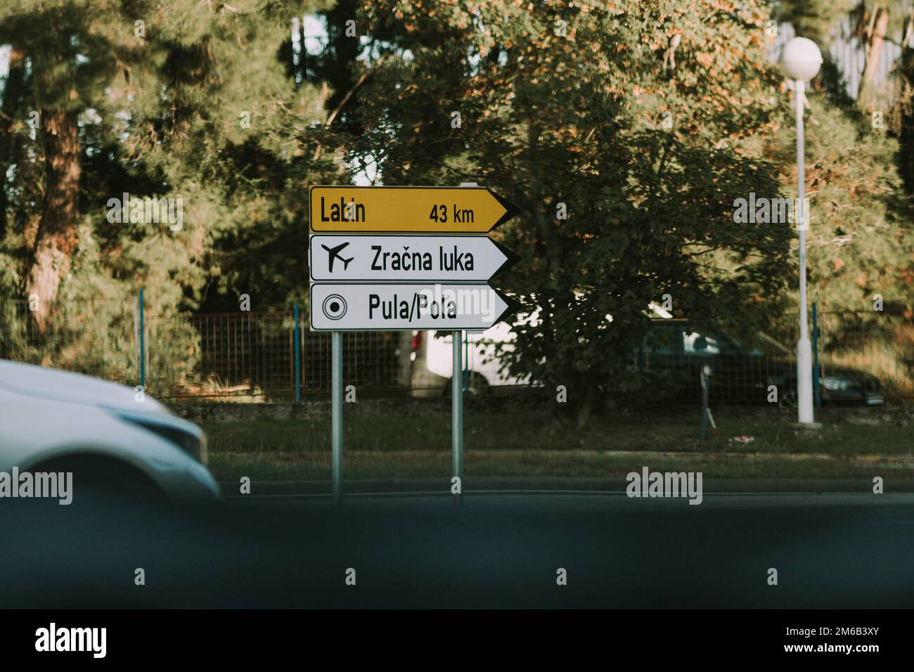Road signs on the road Stock Photo - Alamy
