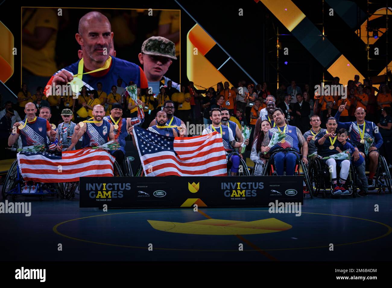 Team U.S. athletes pose for a photo after the final wheelchair ...
