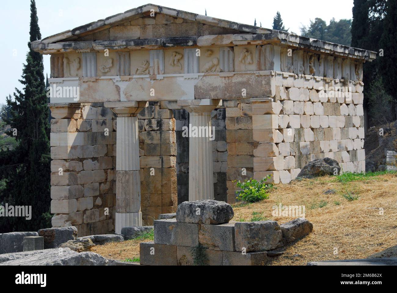 The reconstructed Treasury of the Athenians, Delphi, ancient sacred ...
