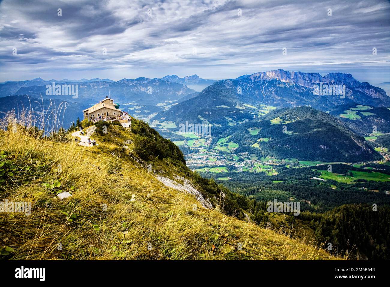 Hitler's Eagles Nest or Kehlstein overlooks a deep green valley in ...