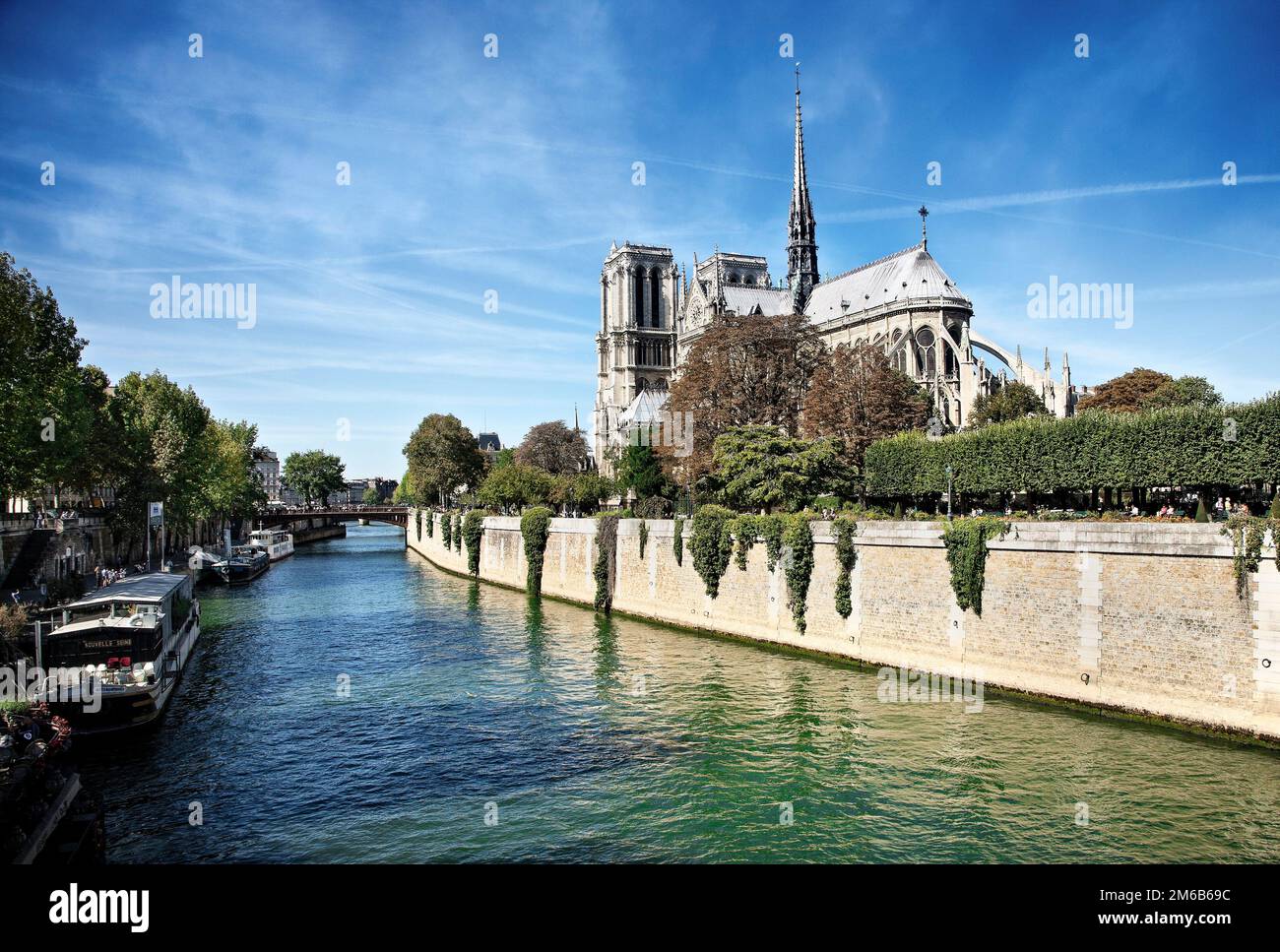 Notre Dame rises above the River Seine on Ile de La Cite in central ...