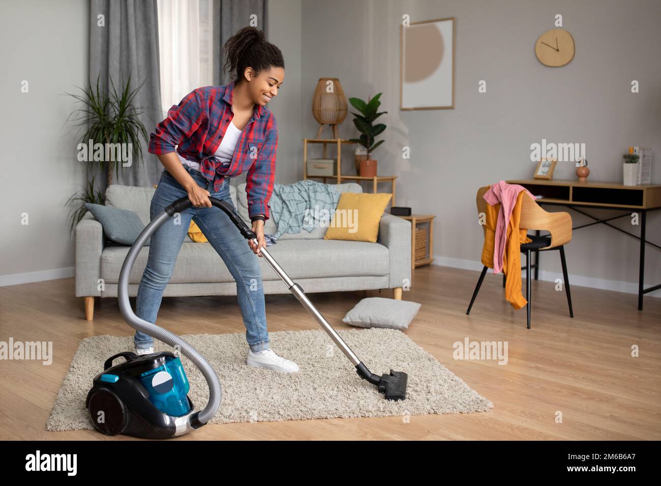 Lifestyle and work at home. Smiling millennial african american lady ...