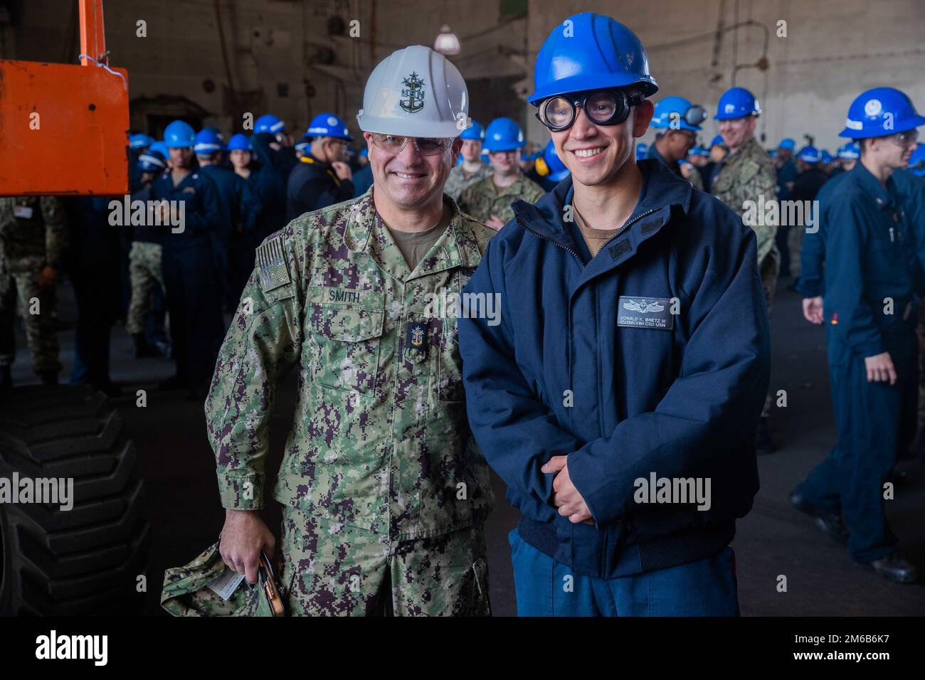 Call in the hangar bay aboard the nimitz class aircraft carrier hi-res ...