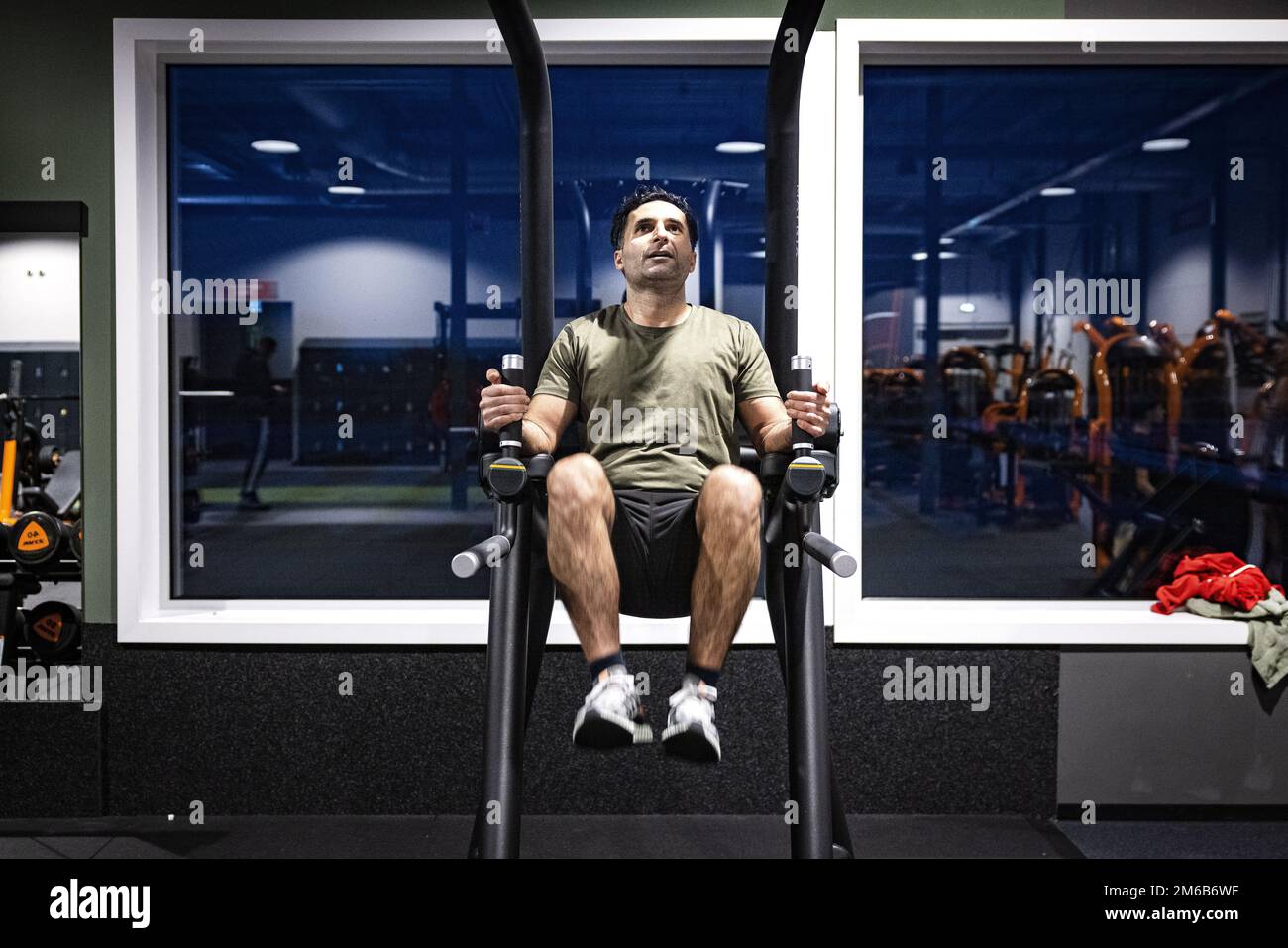 AMSTERDAM - An athlete in a branch of fitness club Basic-Fit. ANP RAMON ...