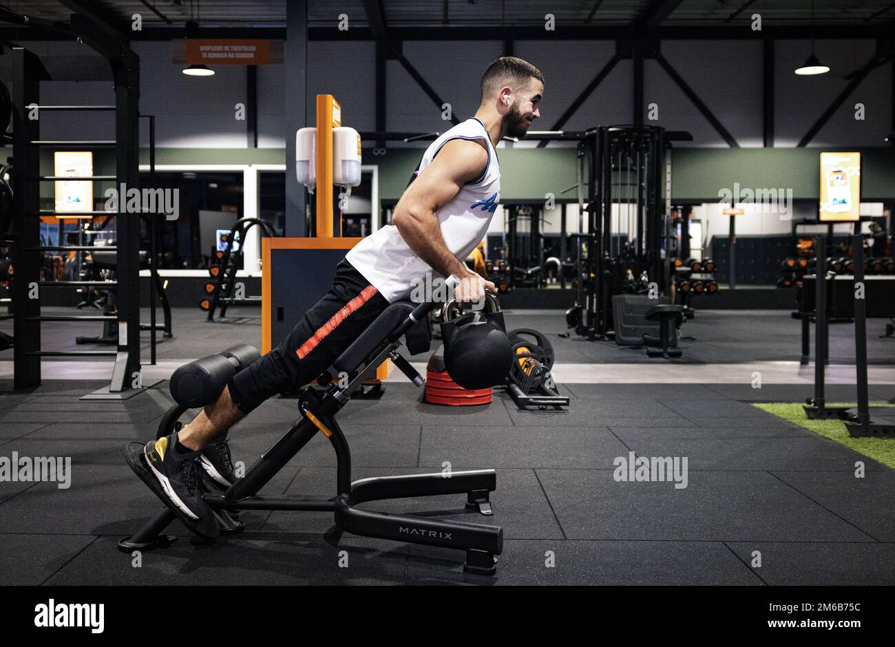 AMSTERDAM - An athlete in a branch of fitness club Basic-Fit. ANP RAMON ...