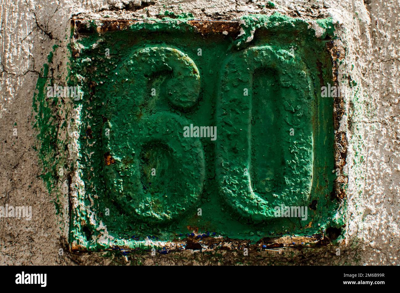 Old retro weathered painted cast iron plate 60 Stock Photo - Alamy