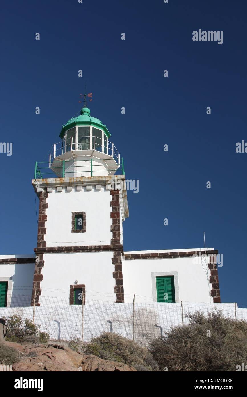 Lighthouse on a cliff Stock Photo - Alamy