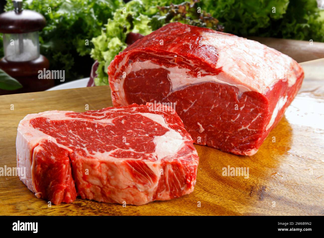 Red Raw Steak Sirloin against, contra file Stock Photo - Alamy
