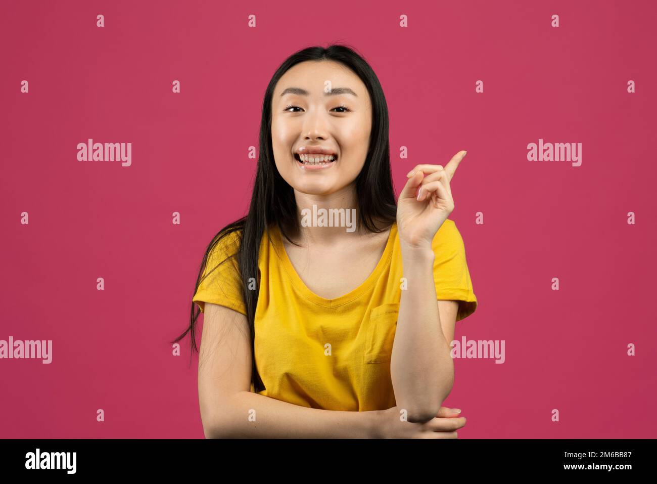Aha moment. Portrait of happy asian lady having great idea, finding ...