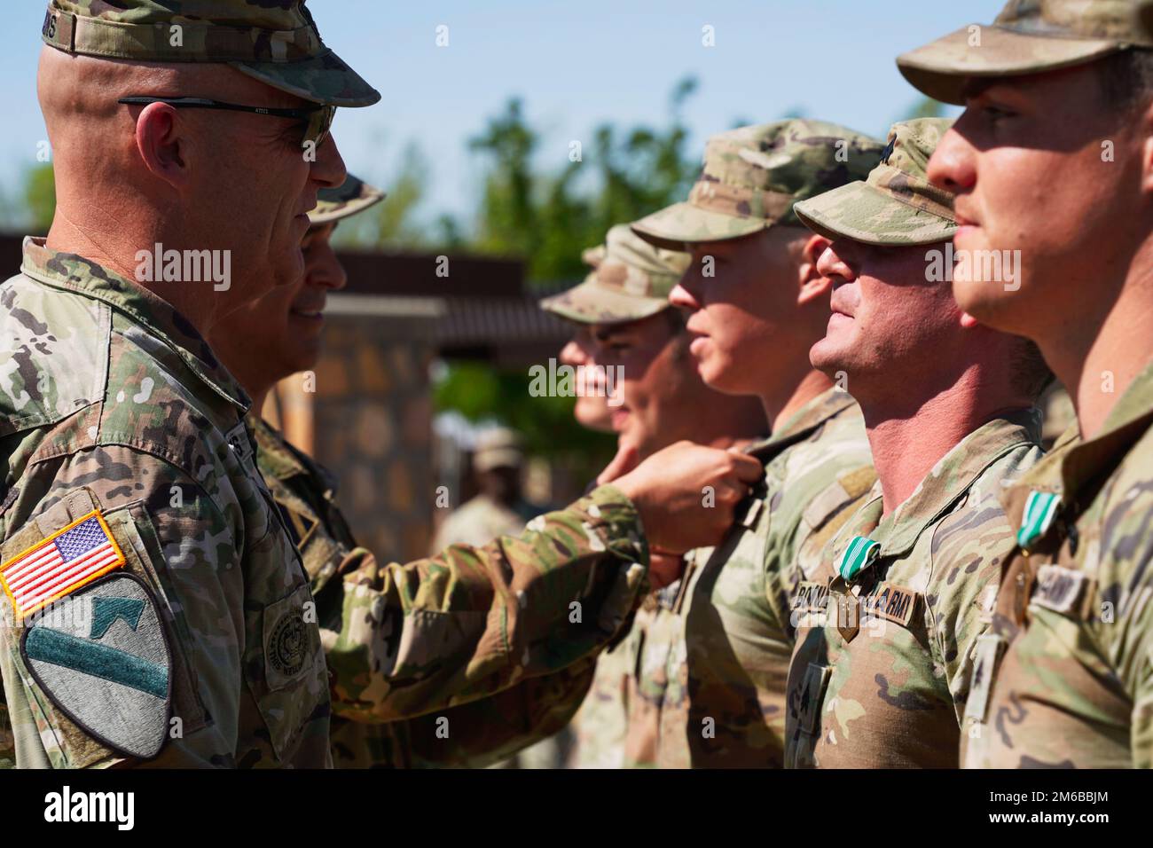 U.S. Soldiers, assigned to the 1st Armored Division, receive Army ...