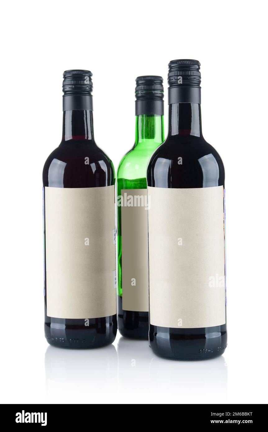 Few red wine bottles close up isolated on white background Stock Photo ...
