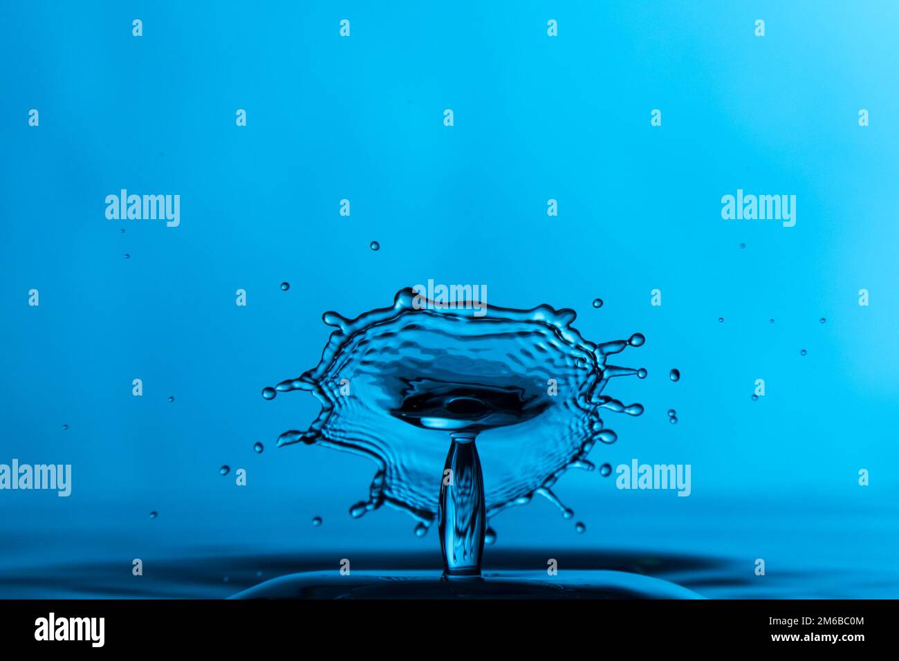 Water droplet splash Stock Photo - Alamy