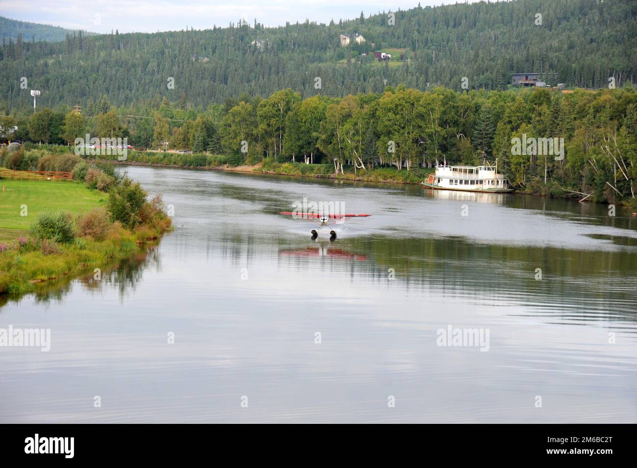 A small water-plane takes off the a 10-mile-long Chena river, which ...