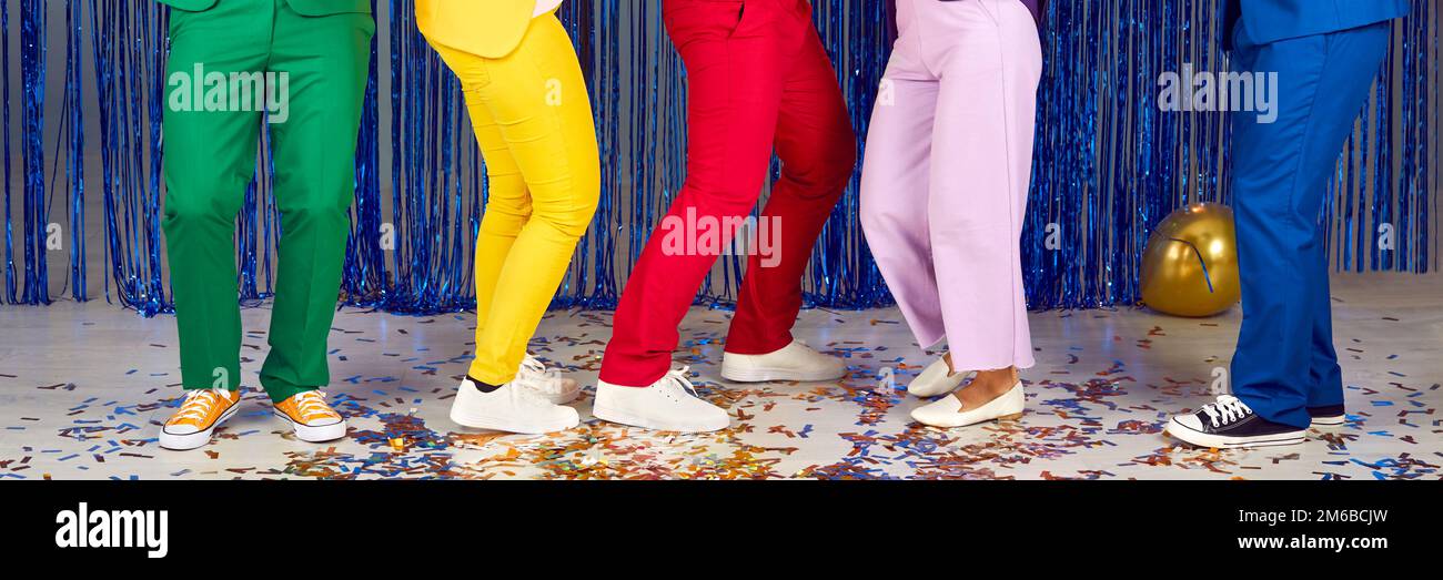 Legs of different young men and women who are having fun and partying ...