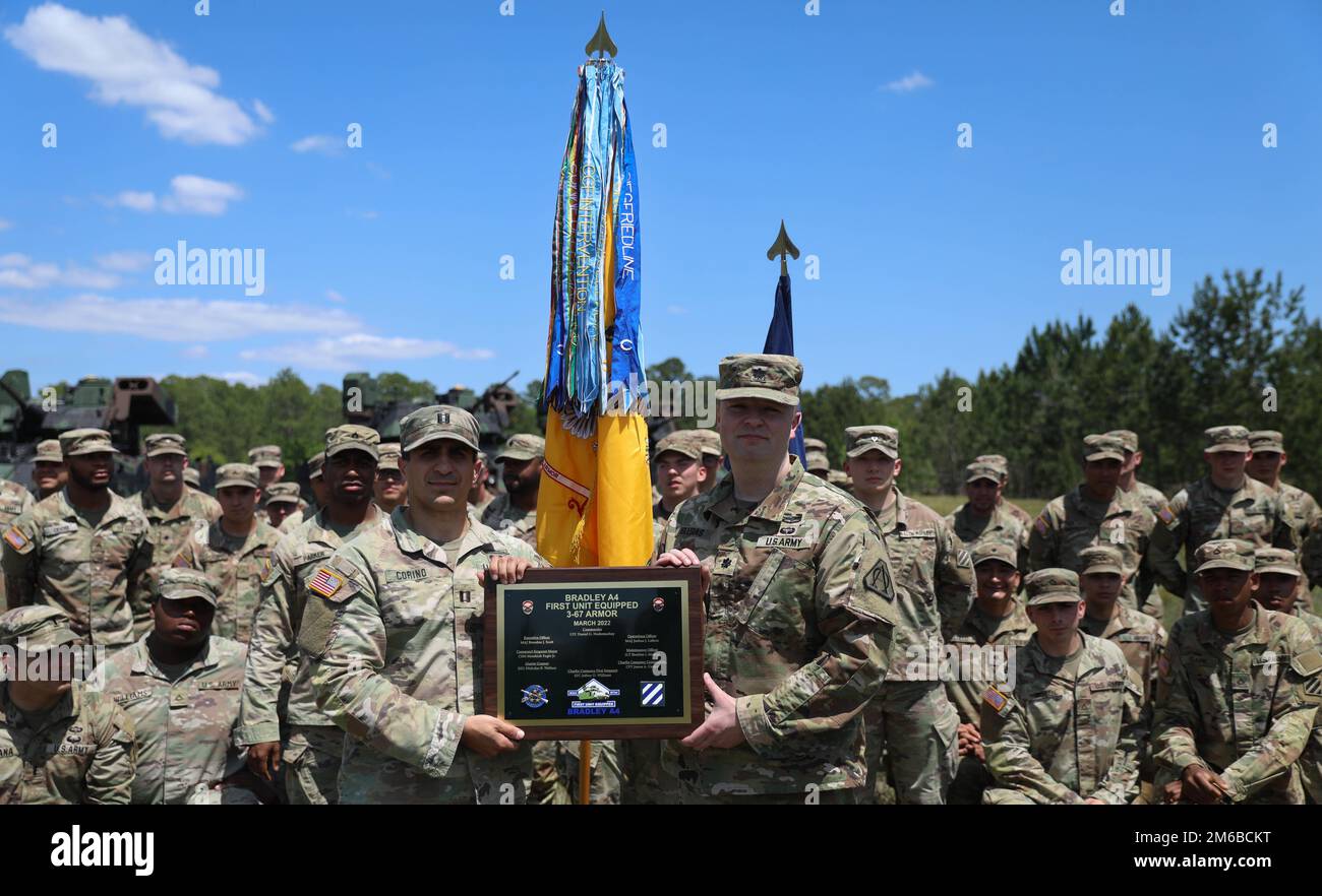 Lt. Col. Mario Iglesias, right, the Program Executive Officer Ground ...