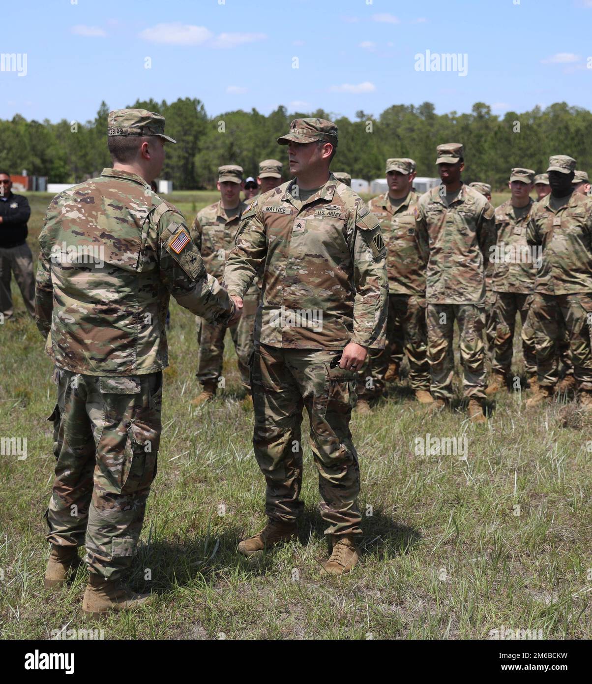 Lt. Col. Mario Iglesias, left, the Program Executive Officer Ground ...