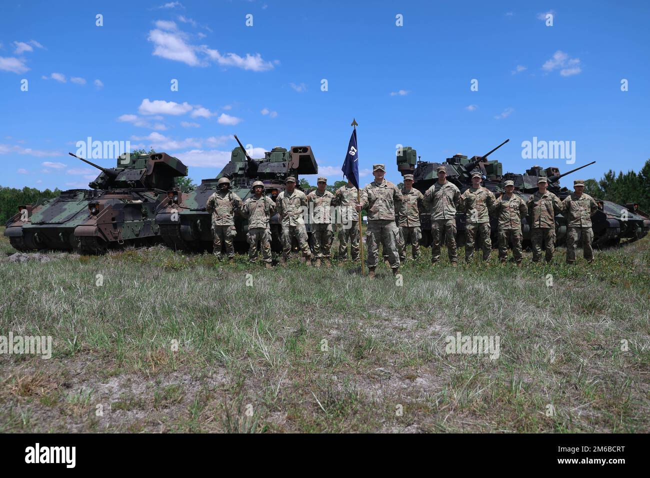 Three modernized M2A4 Bradley Fighting Vehicle crews assigned to the ...