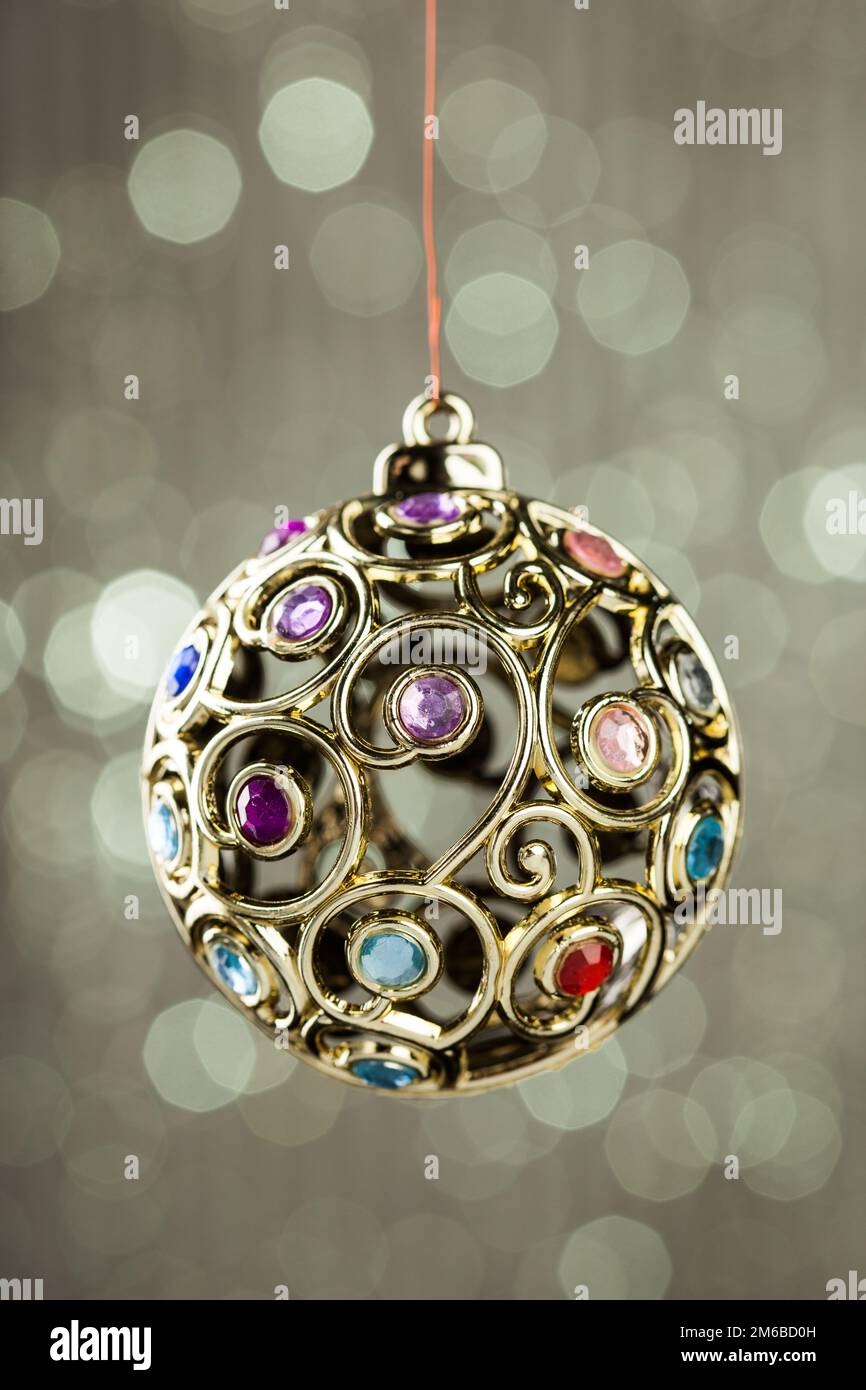 Christmas ball on sparkles background Stock Photo - Alamy