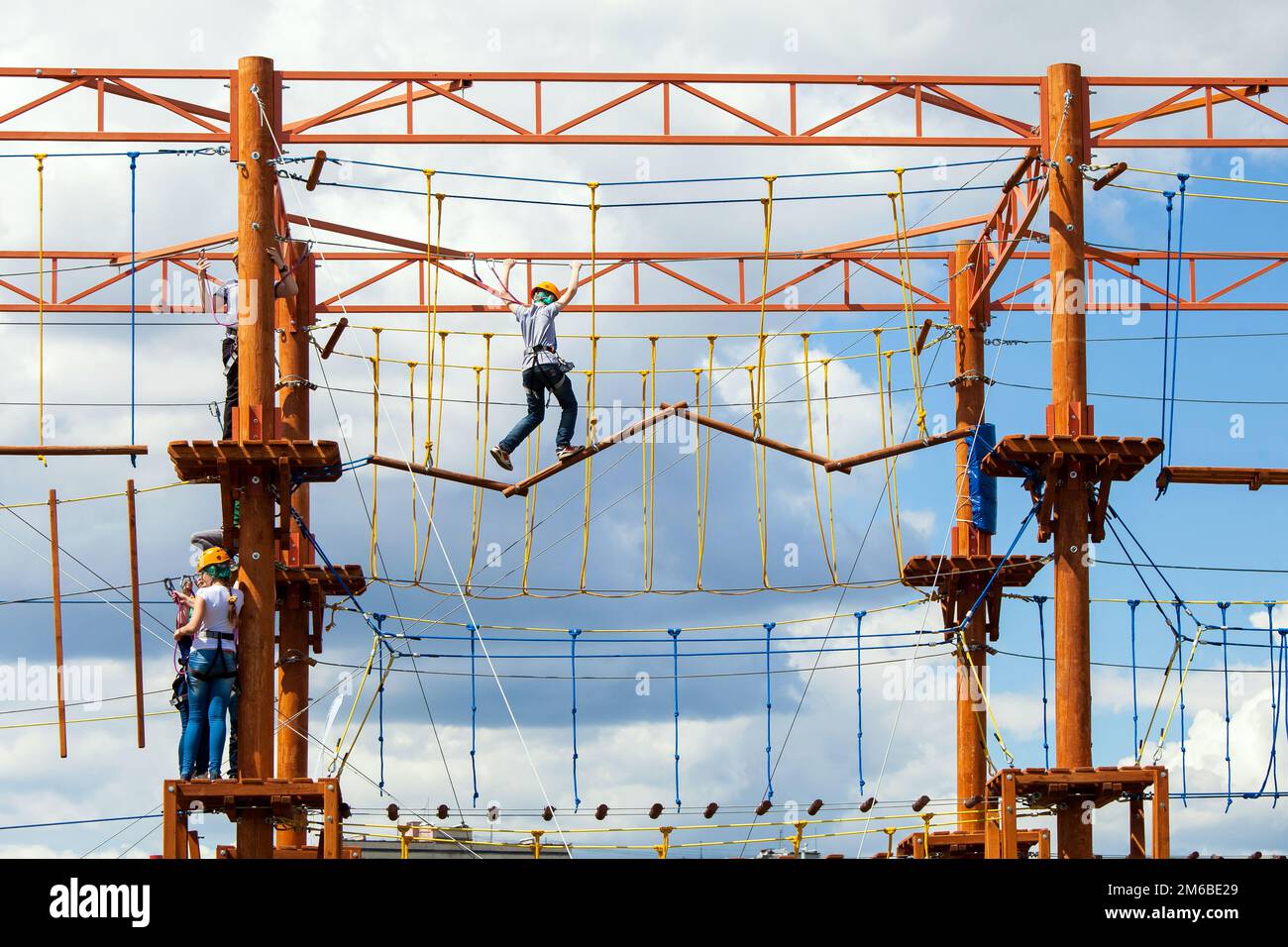 Climbing kids in rope park Stock Photo - Alamy