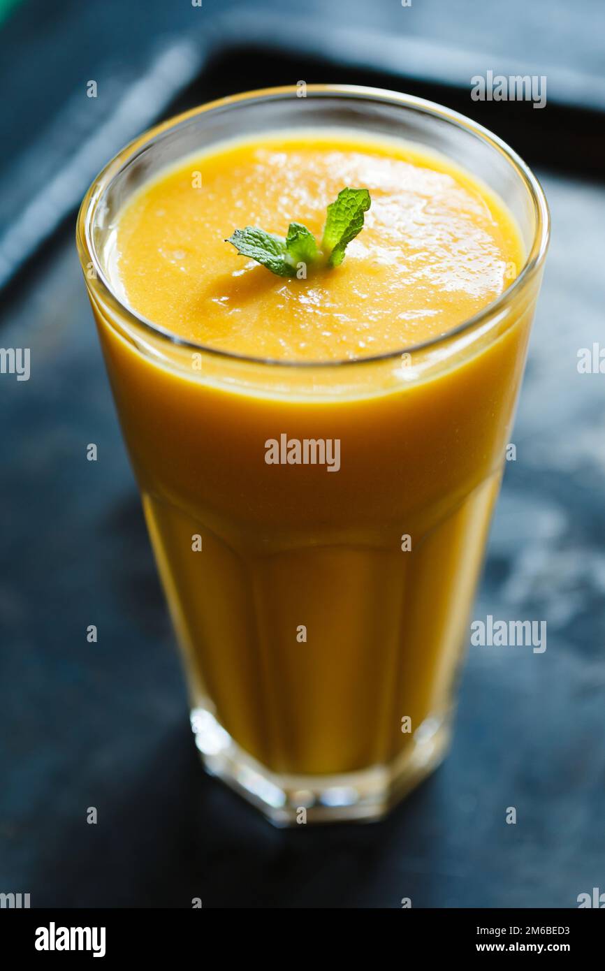 Mango smoothie in glass fresh hi-res stock photography and images - Alamy