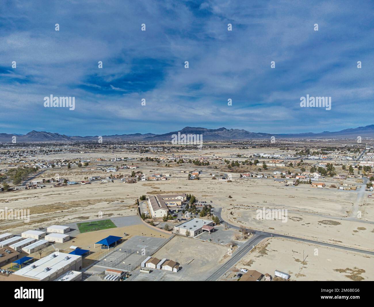 An aerial cityscape of Pahrump Nevada in Mount Charleston and houses ...