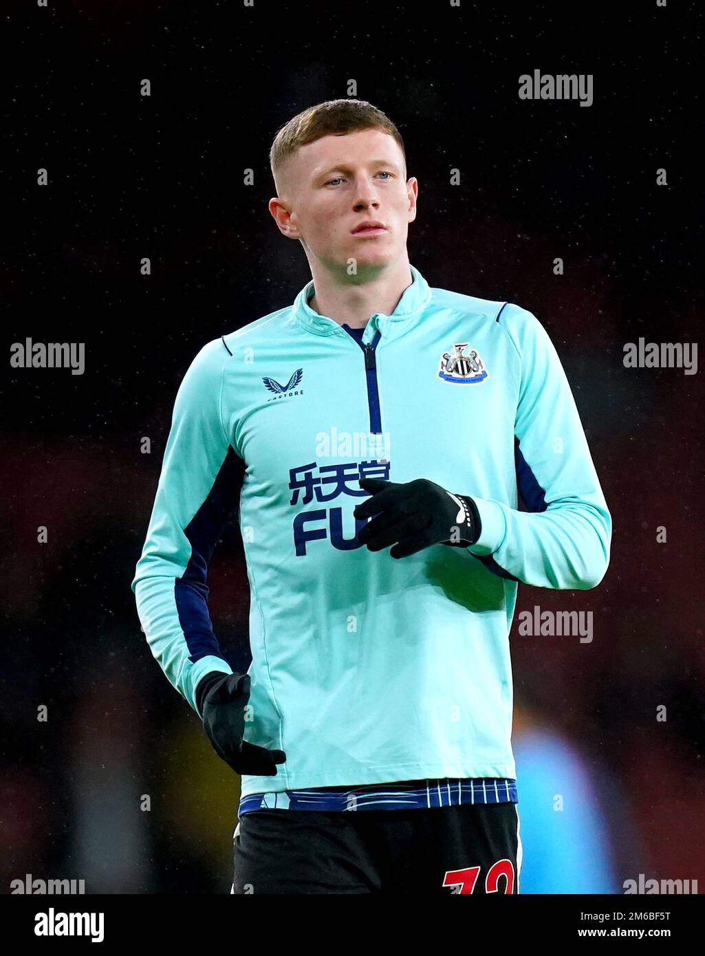 Newcastle United's Elliot Anderson warms up on the pitch ahead of the ...