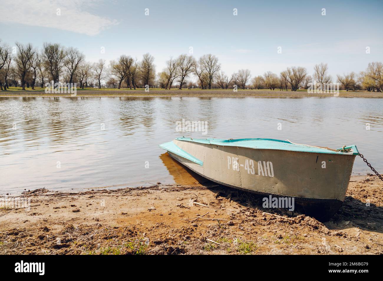 Boat at the riverside Stock Photo - Alamy